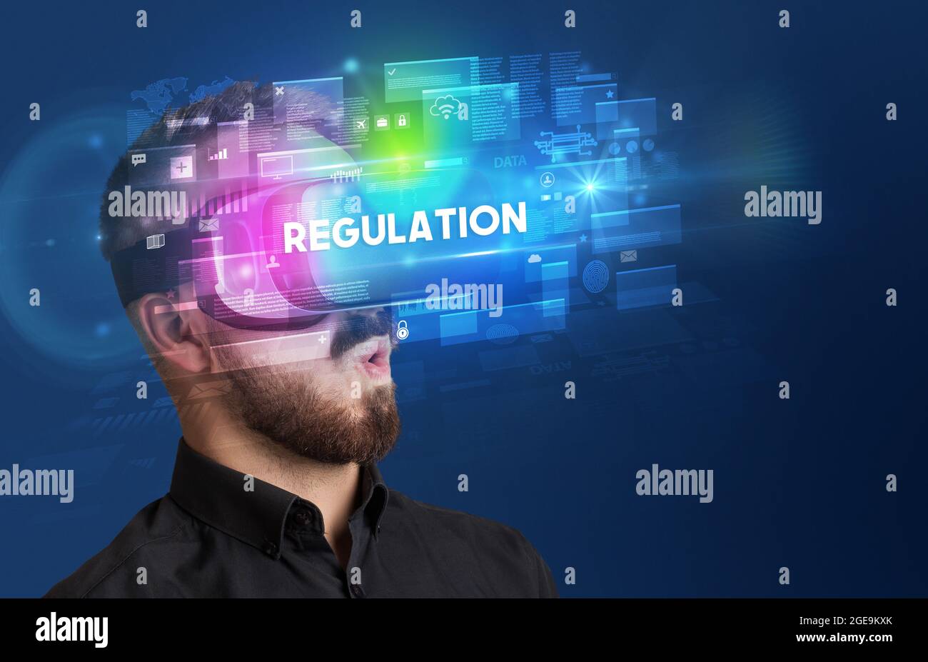 Businessman looking through Virtual Reality glasses Stock Photo - Alamy