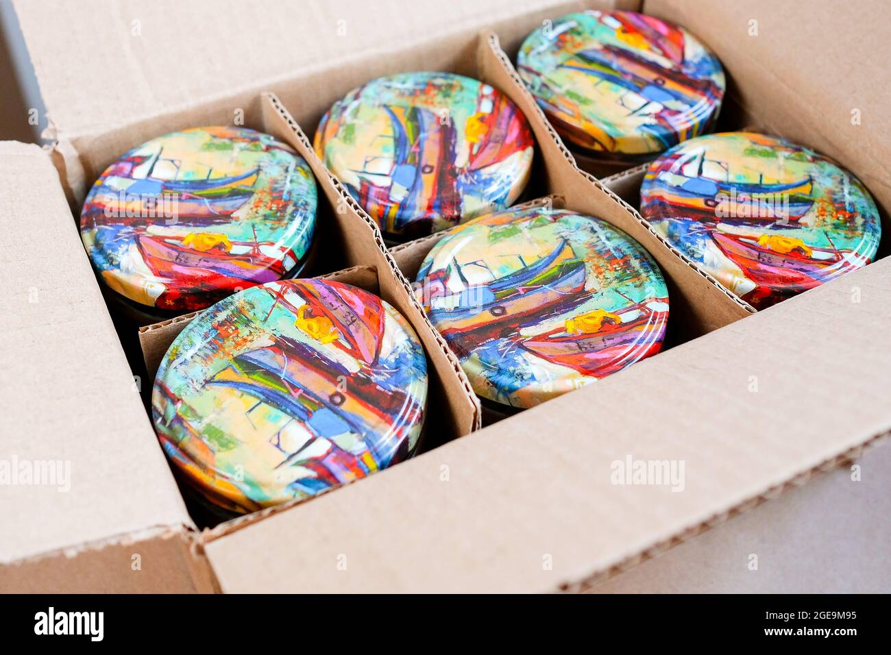 Canned food with a beautiful lid in a cardboard box Stock Photo - Alamy