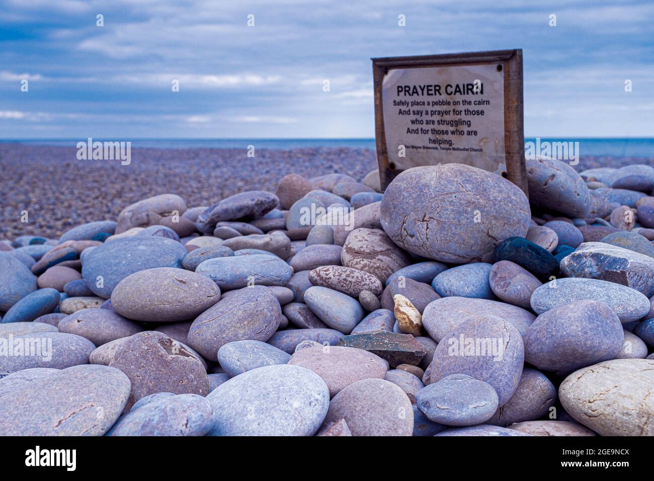 Prayer on beach hi-res stock photography and images - Alamy