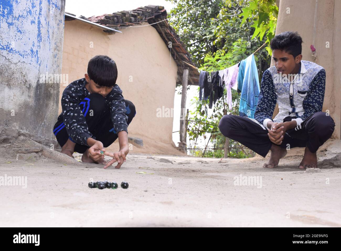 Indian children playing marbles in the village, Beautiful view of rural ...
