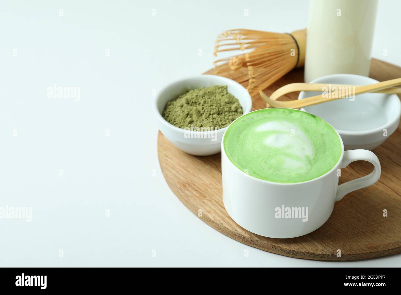 Matcha latte and accessories for making on white background Stock Photo ...