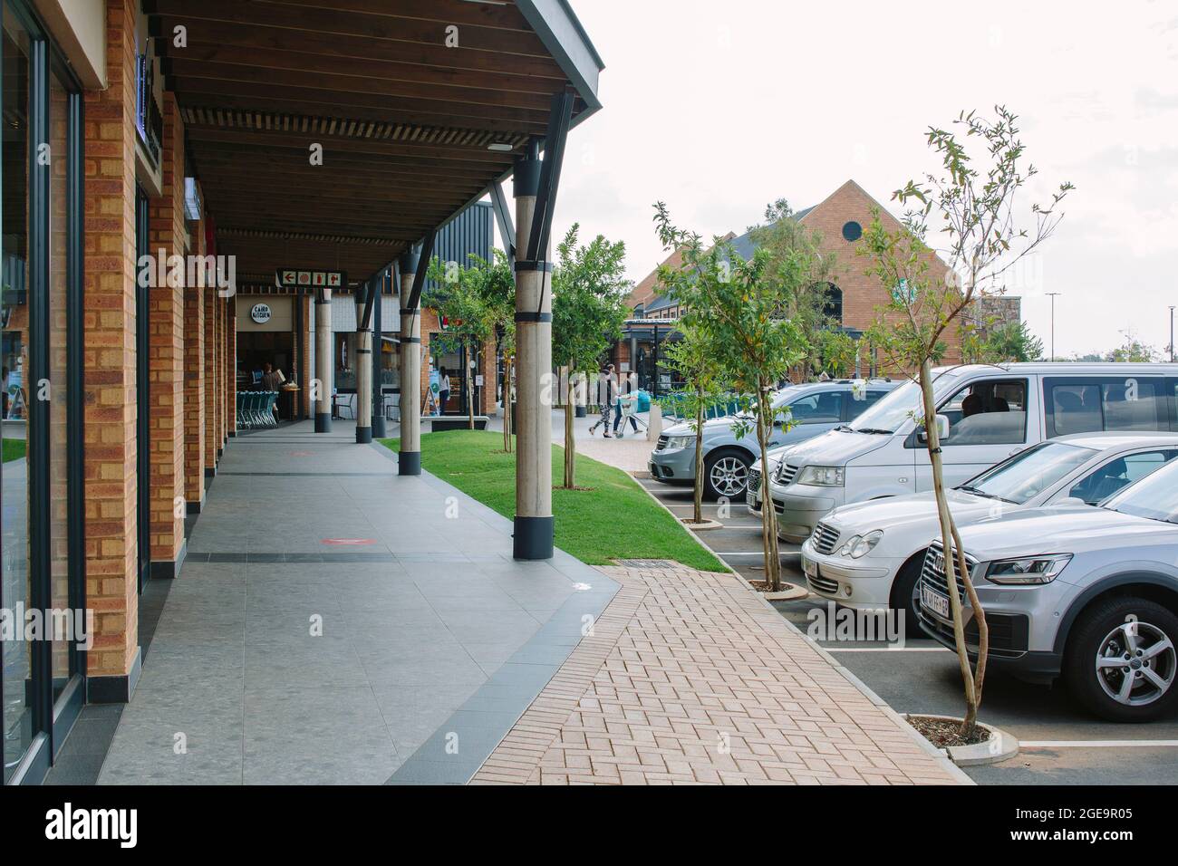 Walkway with portico alongside the car park. Castle Gate Lifestyle ...
