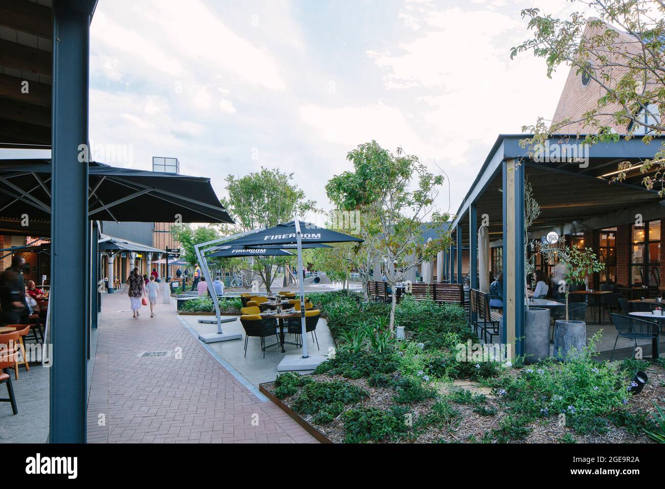 Walkway at main north entrance with restaurant landscaping. Castle Gate ...