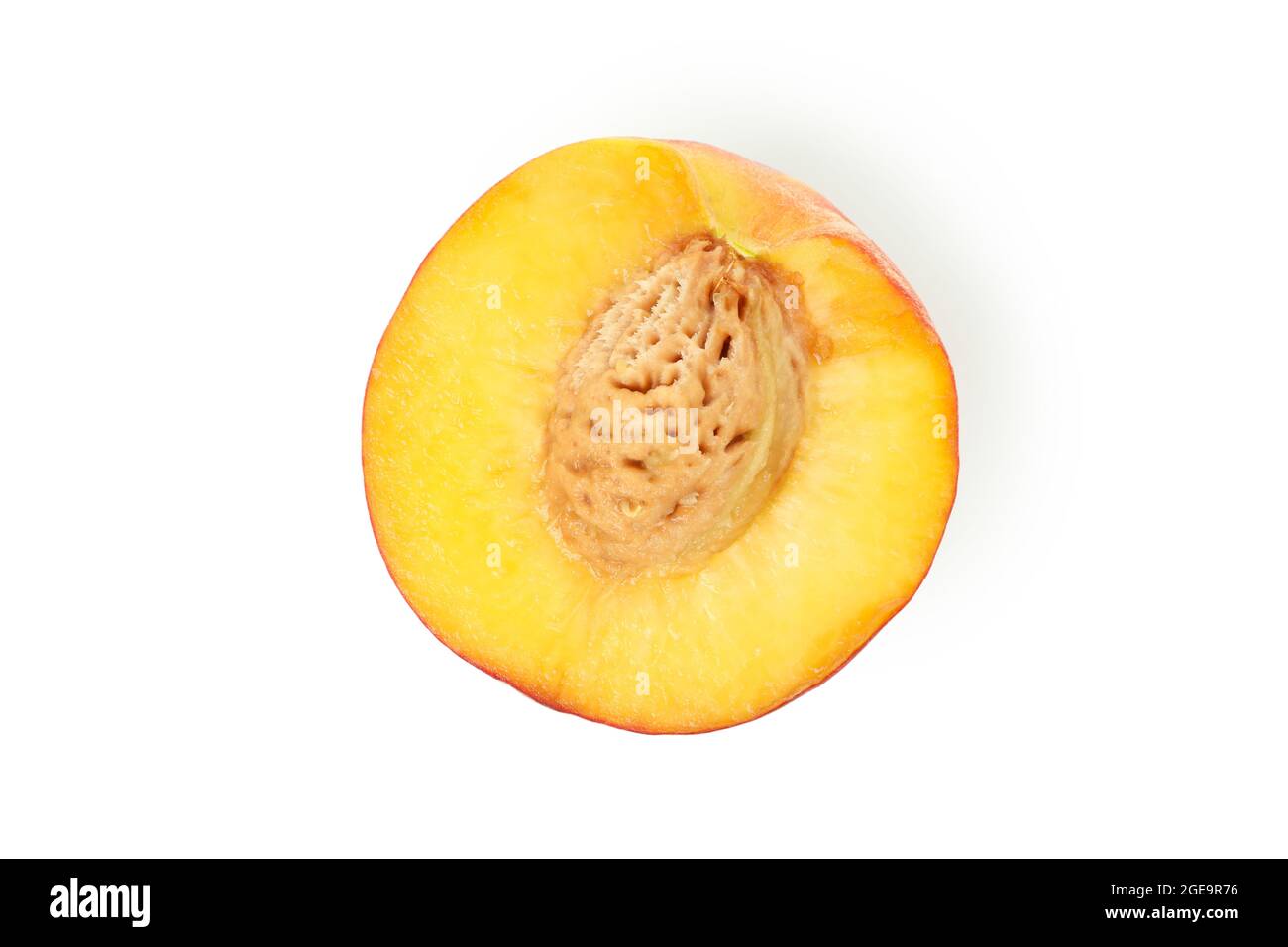 Half of peach fruit isolated on white background Stock Photo - Alamy