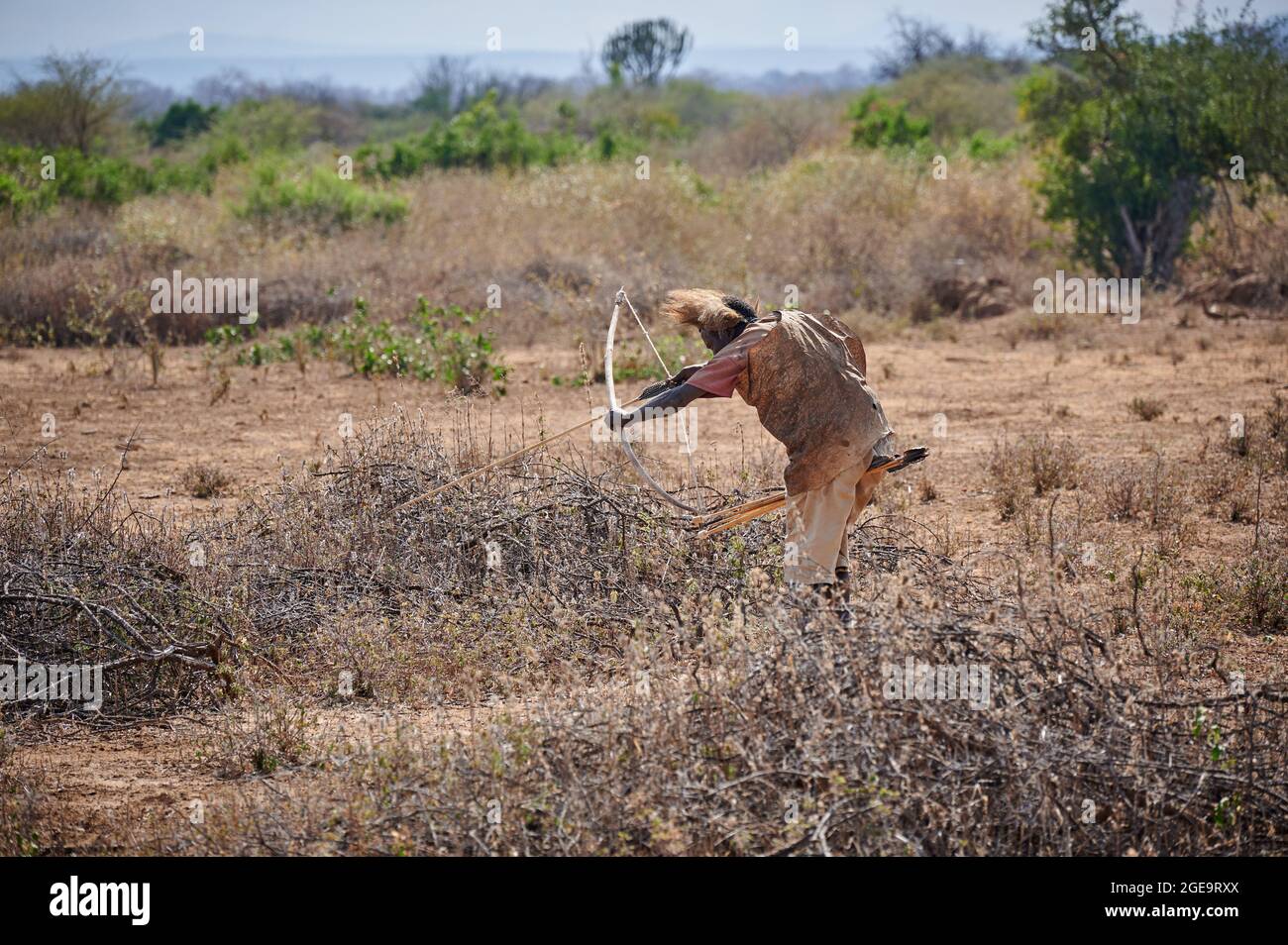 hunting bushmen of Hadzabe tribe with bow and arrow, Lake Eyasi ...