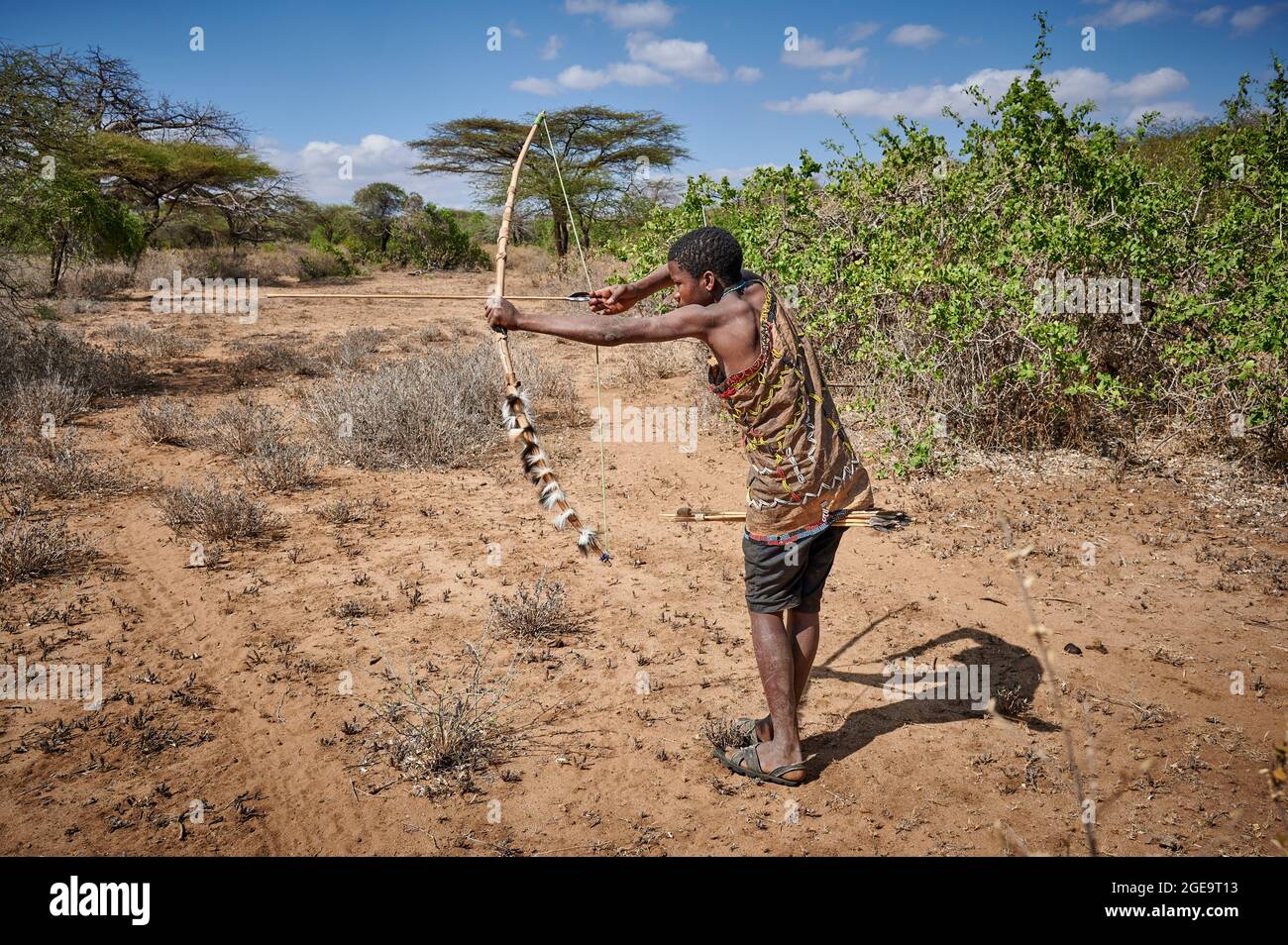 hunting bushmen of Hadzabe tribe with bow and arrow, Lake Eyasi ...