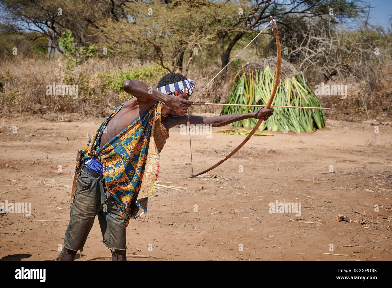 bushmen of Hadzabe tribe train the hunt with bow and arrow, Lake Eyasi ...