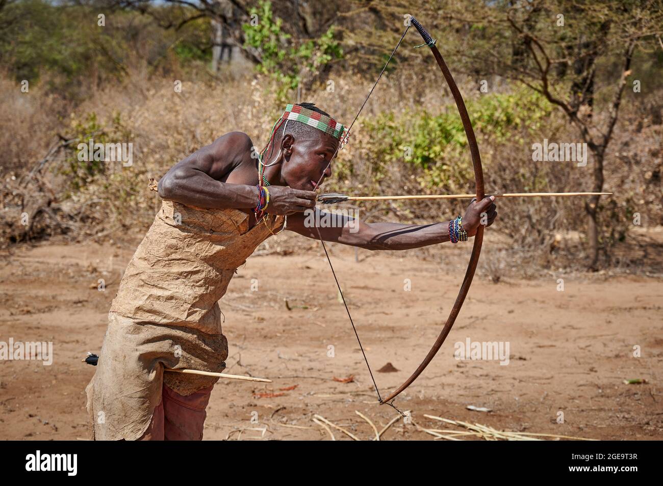 bushmen of Hadzabe tribe train the hunt with bow and arrow, Lake Eyasi ...