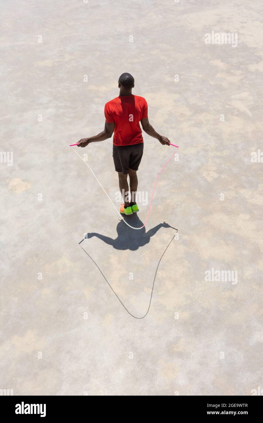 From above back view of anonymous fit African American male athlete ...