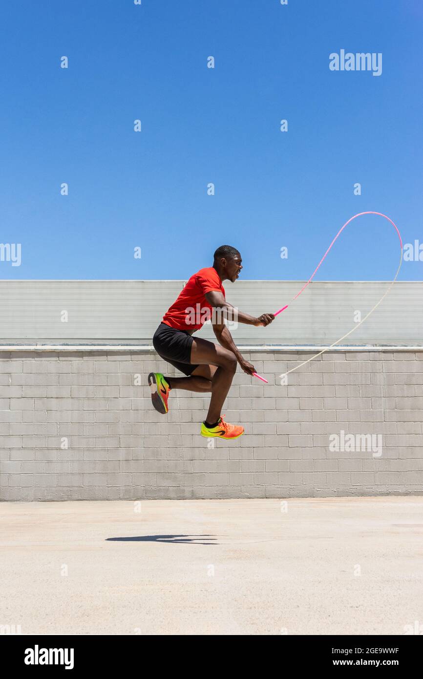 Man skip street hi-res stock photography and images - Alamy