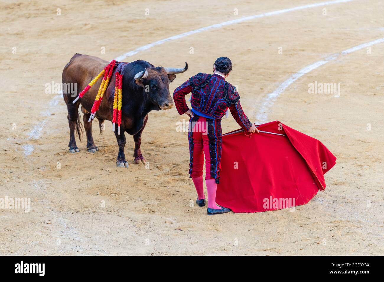 Sword behind back hi-res stock photography and images - Alamy