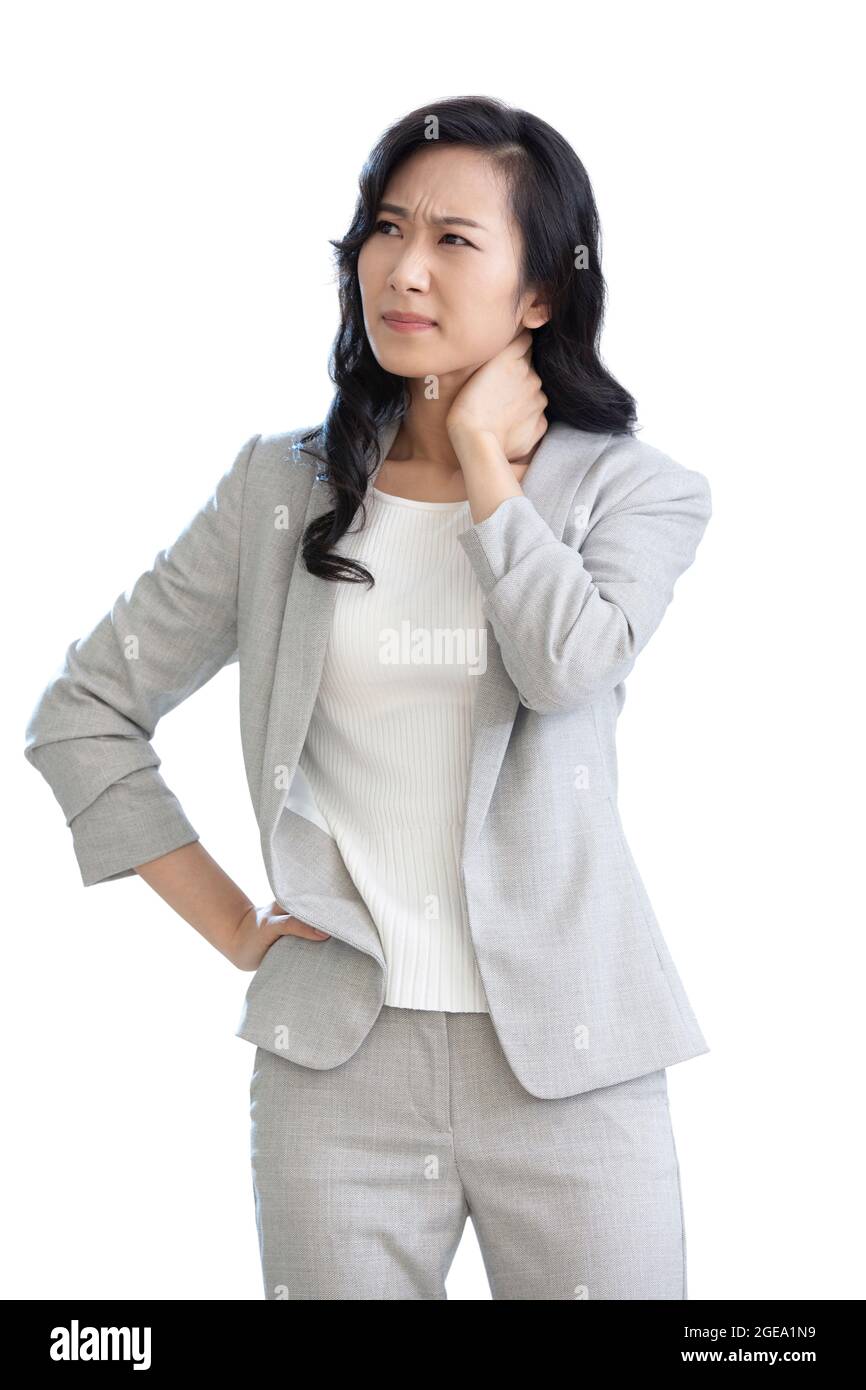 Young Chinese businesswoman with neck pain Stock Photo - Alamy
