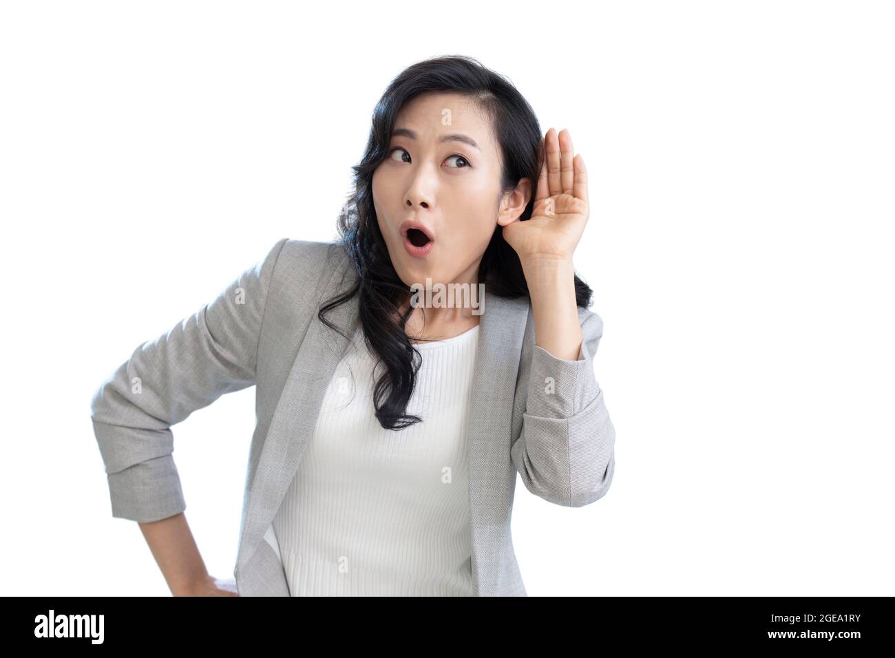 Young Chinese businesswoman eavesdropping Stock Photo - Alamy