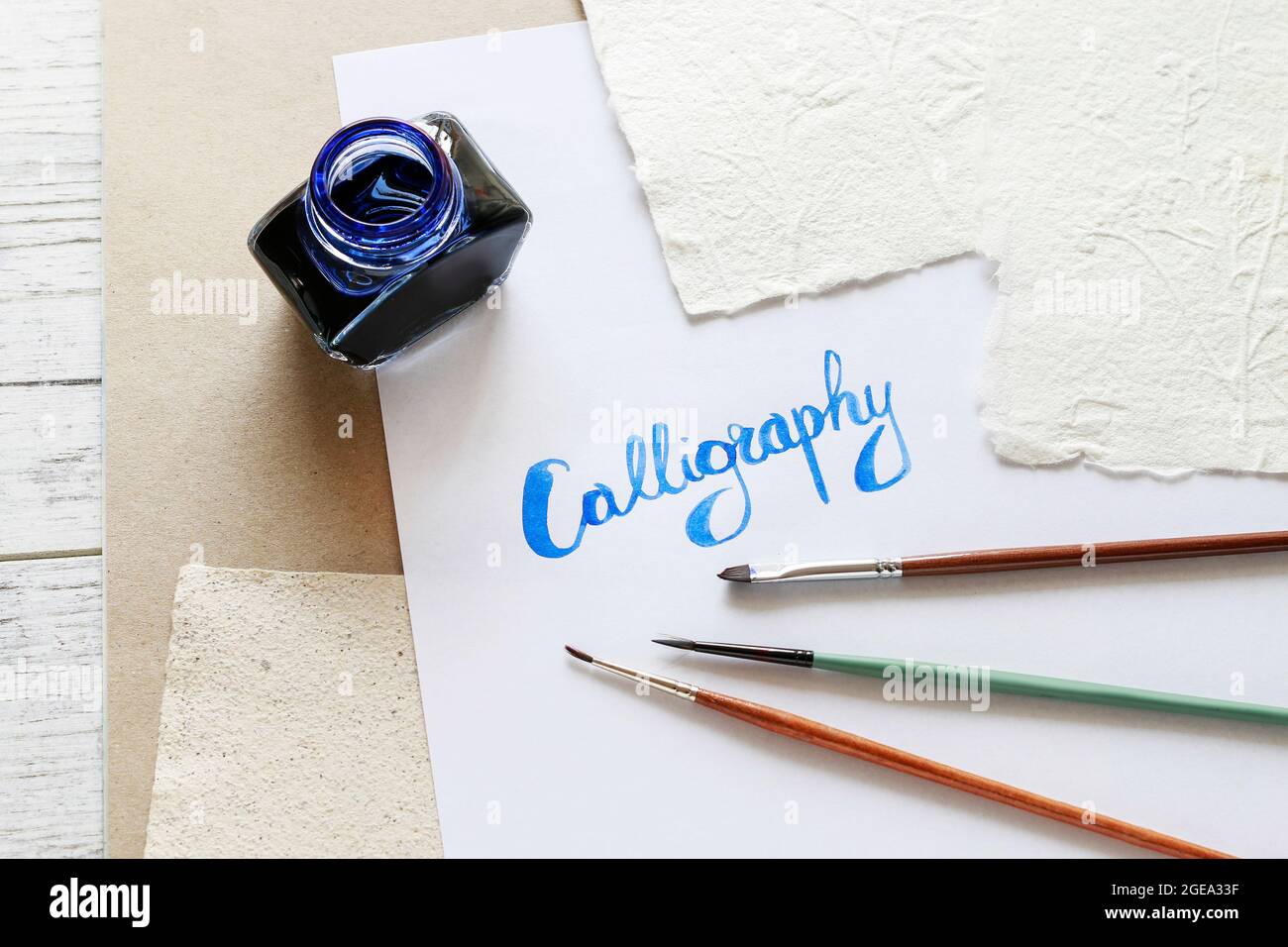 Calligraphy, handwritten letters on white paper. Retro style Stock ...