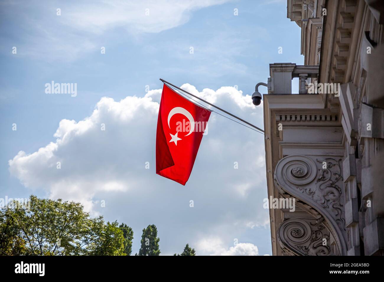 Big flag of Turkey. Turkish flag hanging on the building against the ...