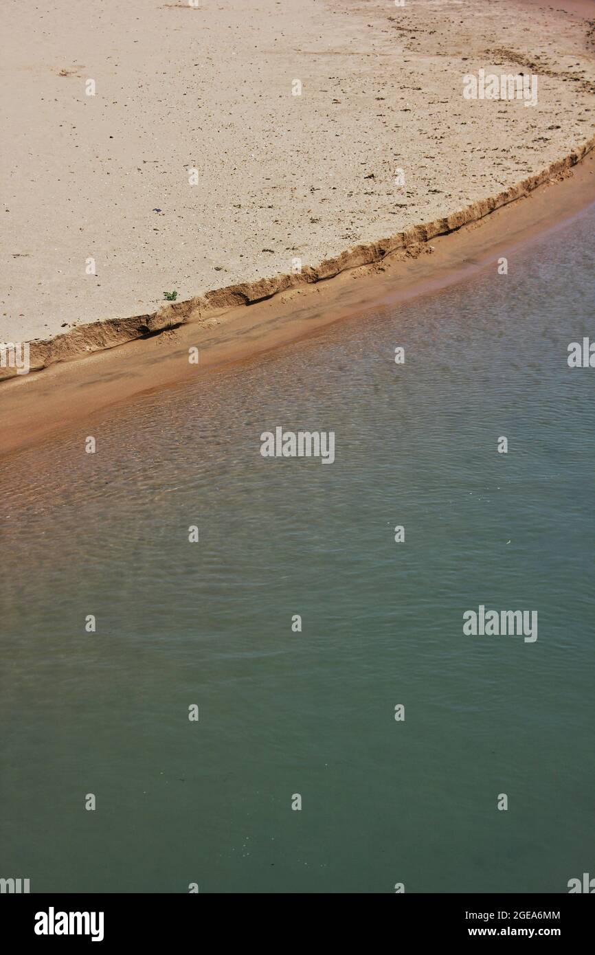 Sand dunes shifting with the waves and tides in the summer sun Stock ...