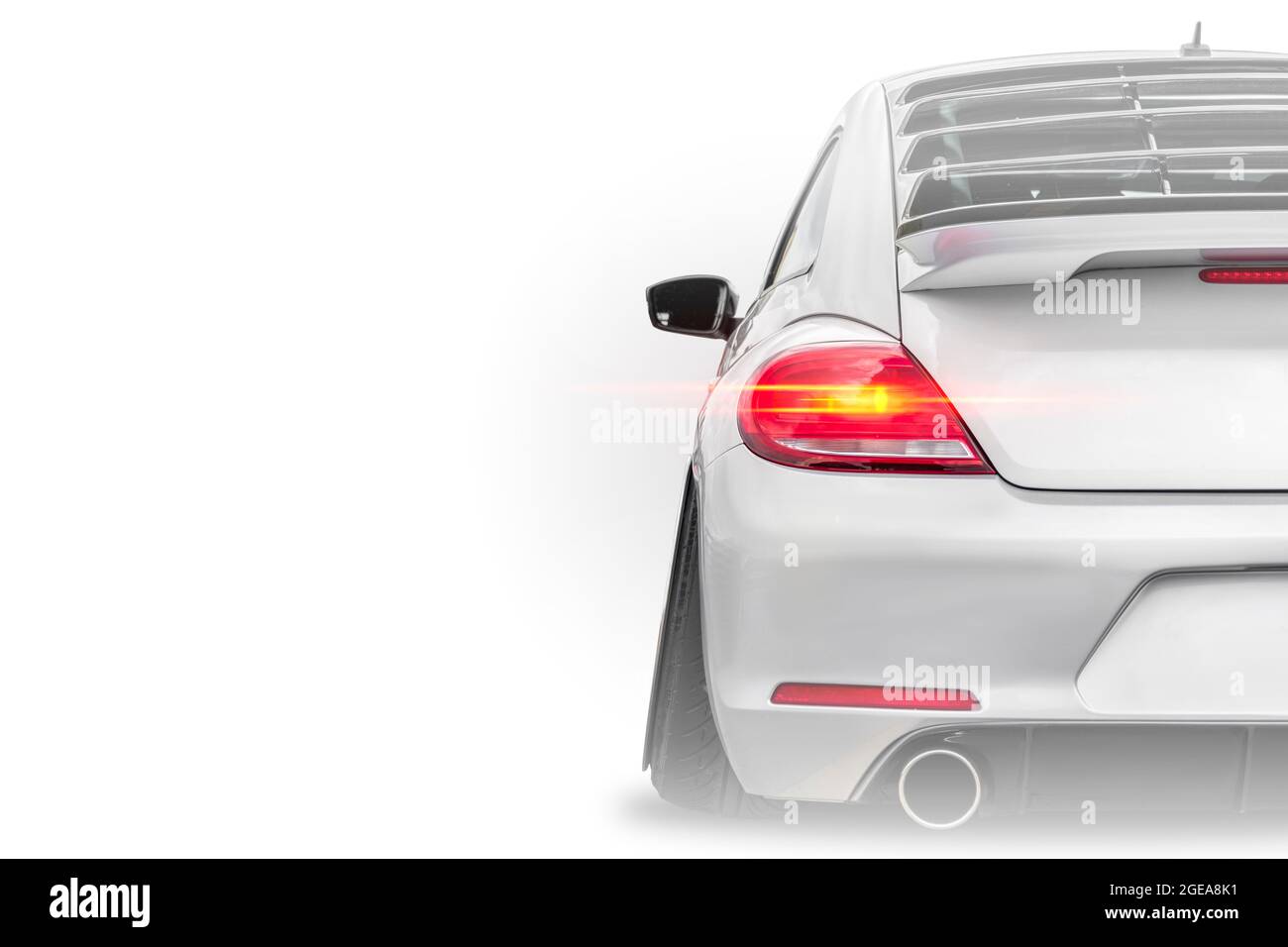 Close up of taillight detail of white modern luxury sportscar isolated ...