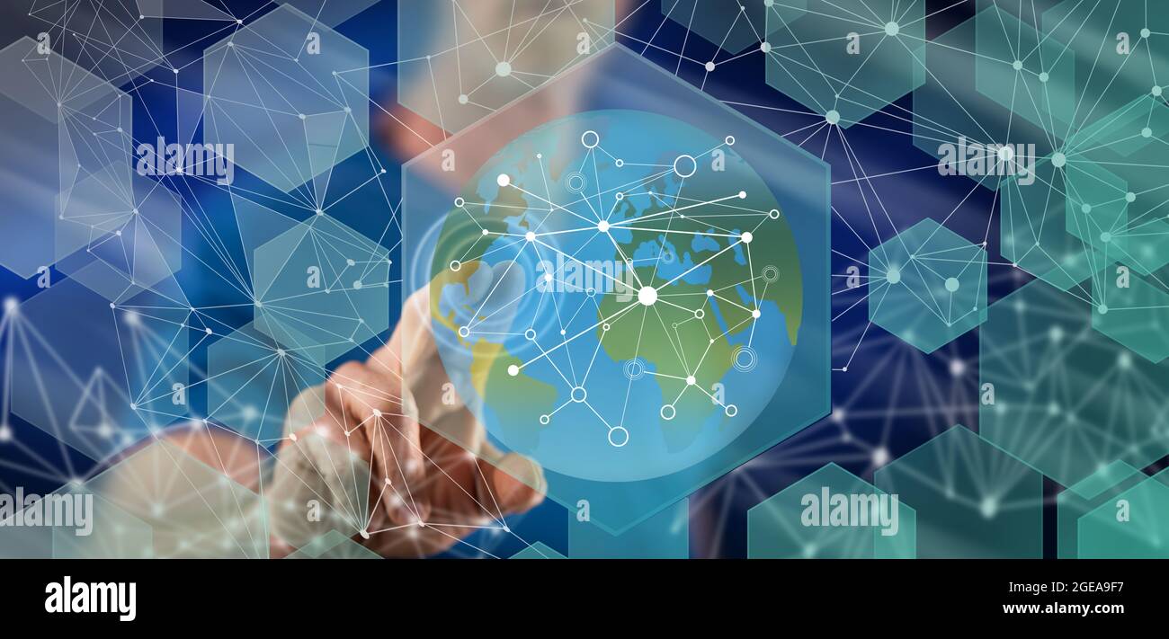 Man touching a global connection concept on a touch screen with his ...