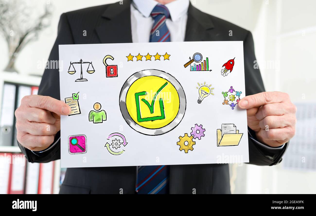 Paper showing validation concept held by a businessman Stock Photo - Alamy