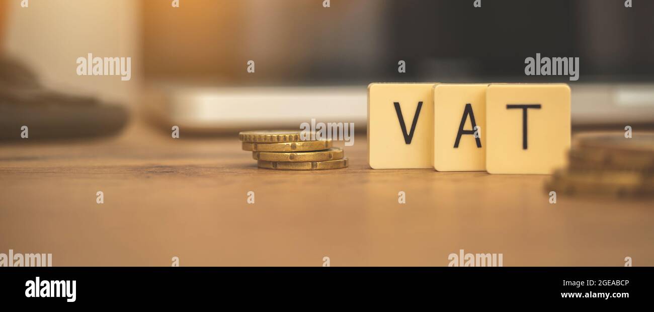 Banner VAT value added tax. Business finance concept with coins and ...