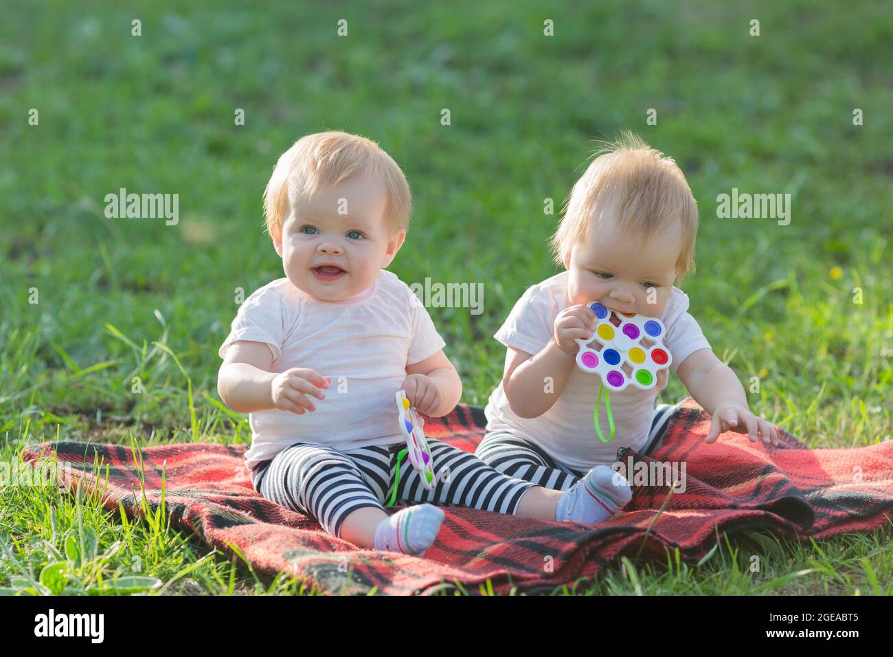 Portrait happy family parents twin hi-res stock photography and images ...