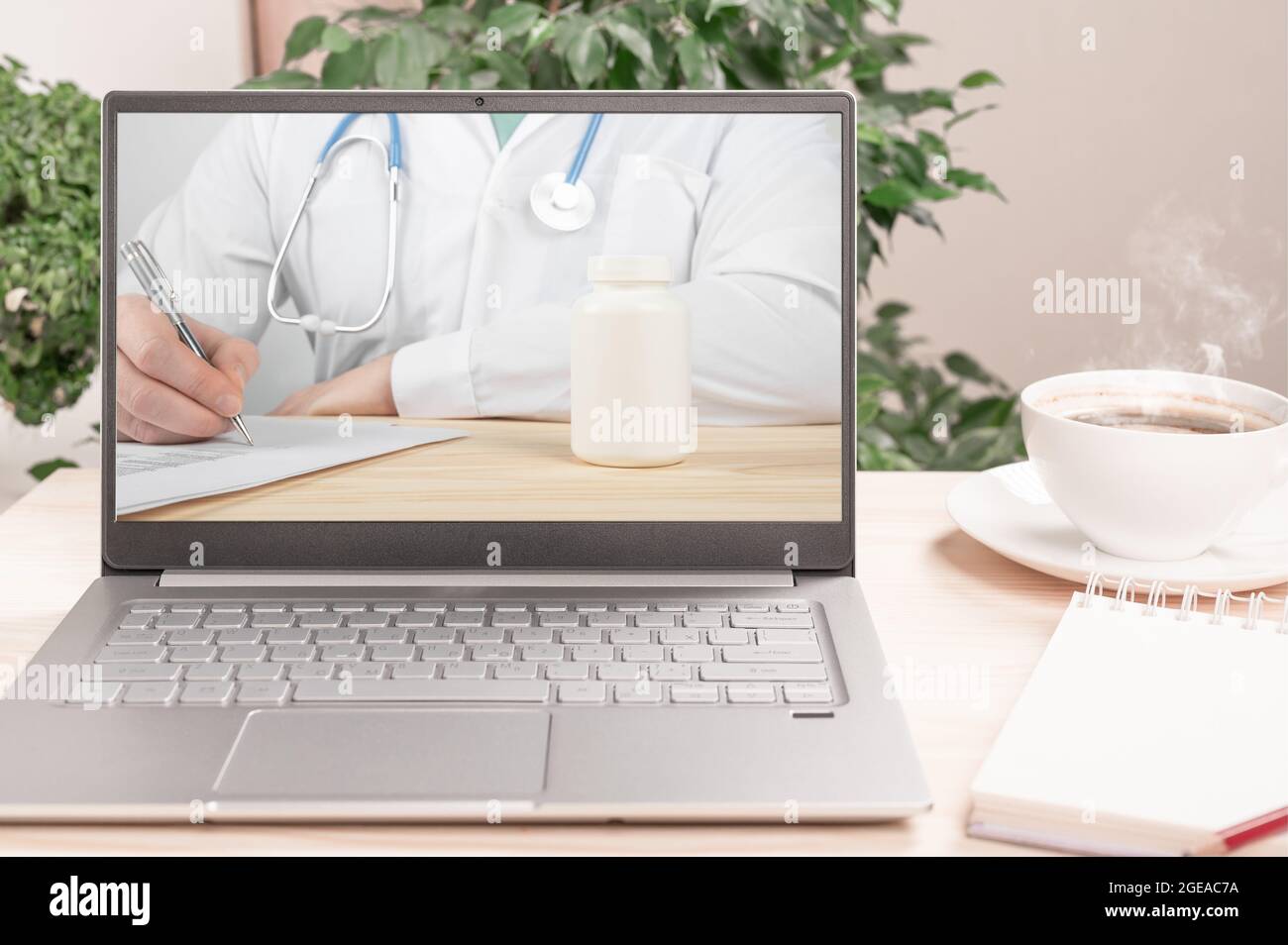 Doctor Writing Prescription on laptop screen. Online consultation ...