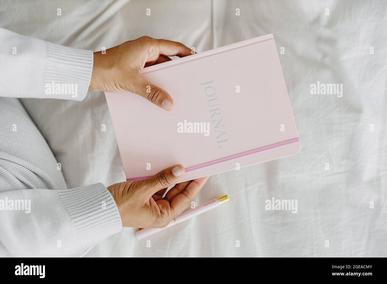 Holding female hi-res stock photography and images - Alamy