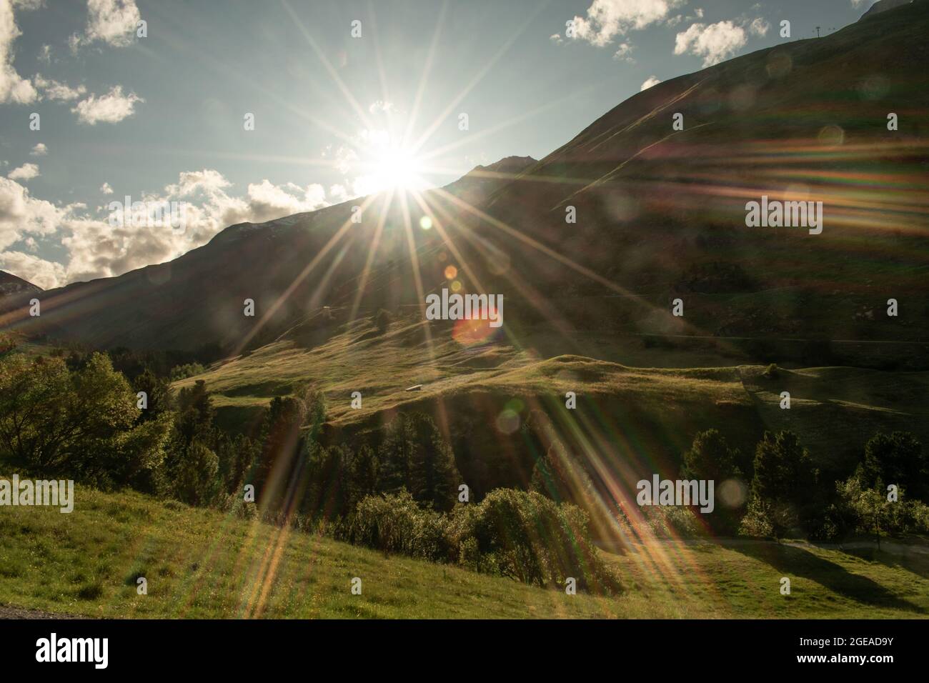 Sun setting in the Alps of Oetz valley Stock Photo - Alamy