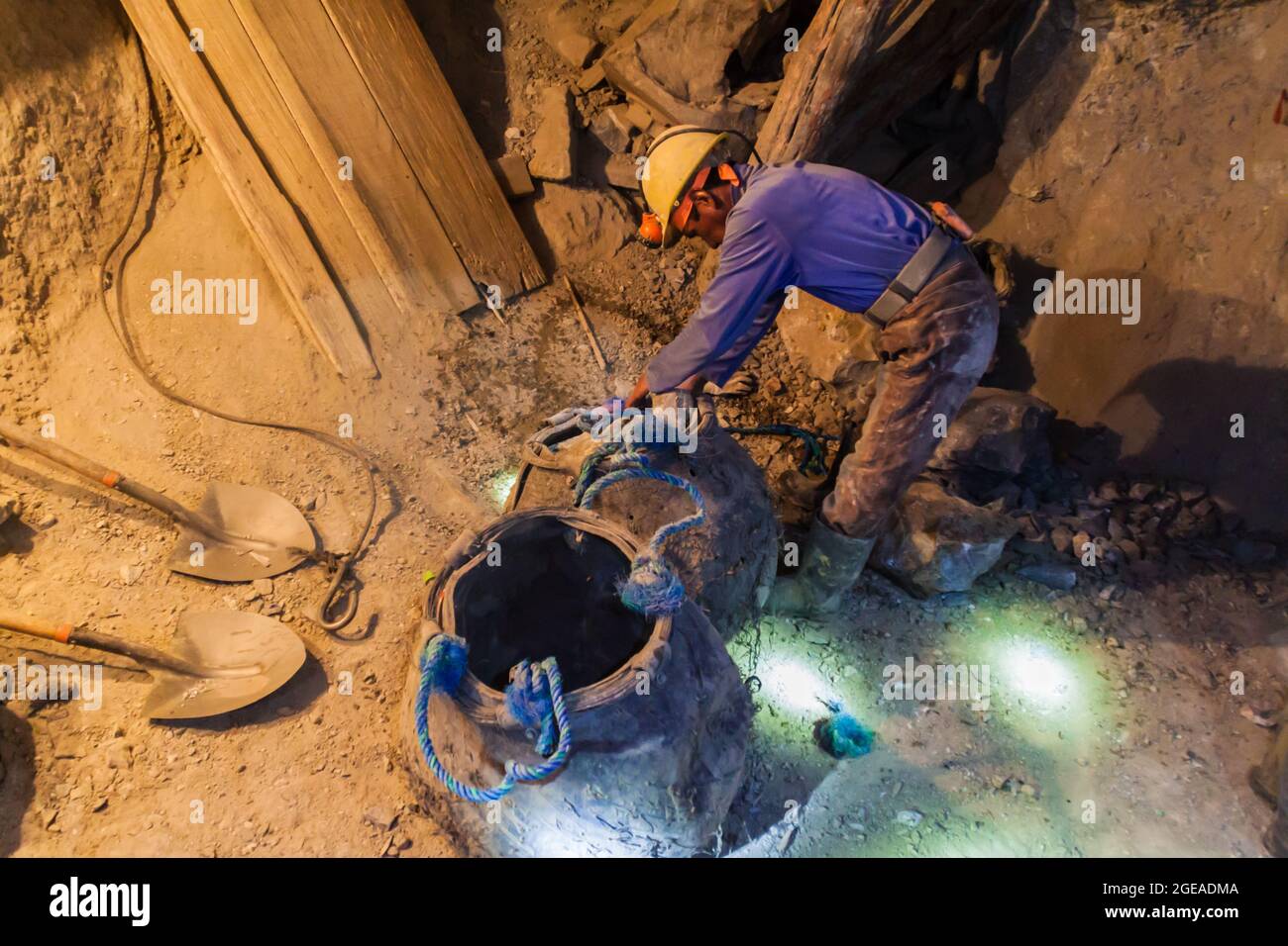 POTOSI, BOLIVIA - APRIL 20, 2015: Bolivian miner works inside Cerro ...