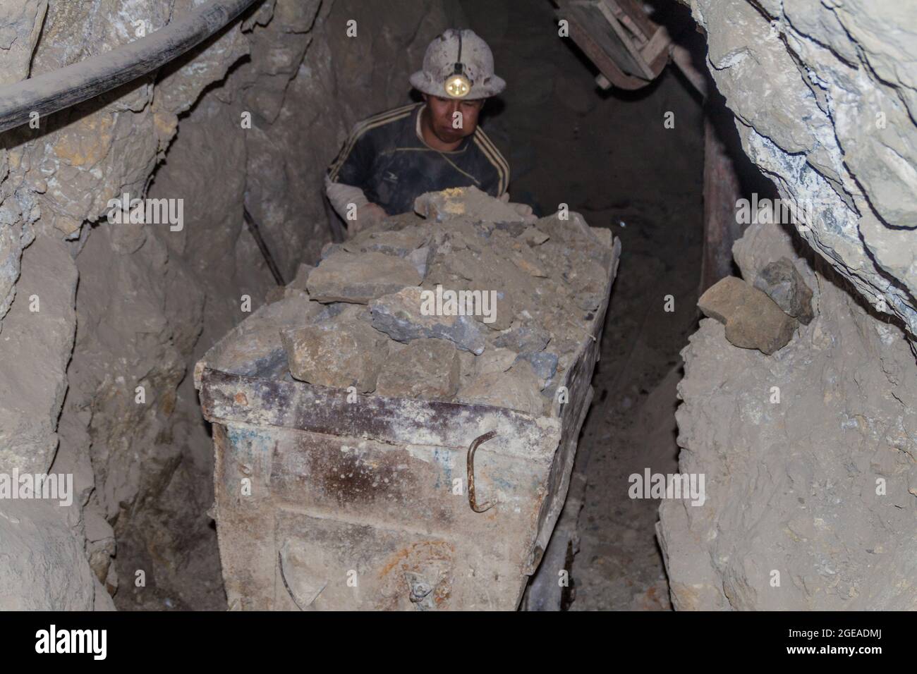POTOSI, BOLIVIA - APRIL 20, 2015: Bolivian miner works inside Cerro ...