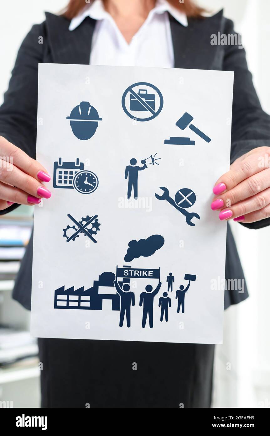 Paper with strike concept held by a businesswoman Stock Photo - Alamy