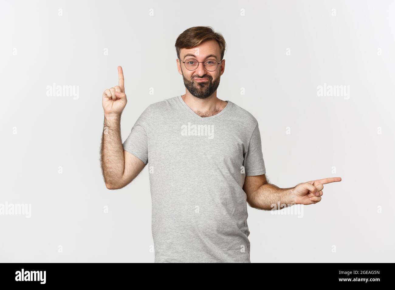 Indecisive bearded guy with beard, pointing up and right, showing two ...