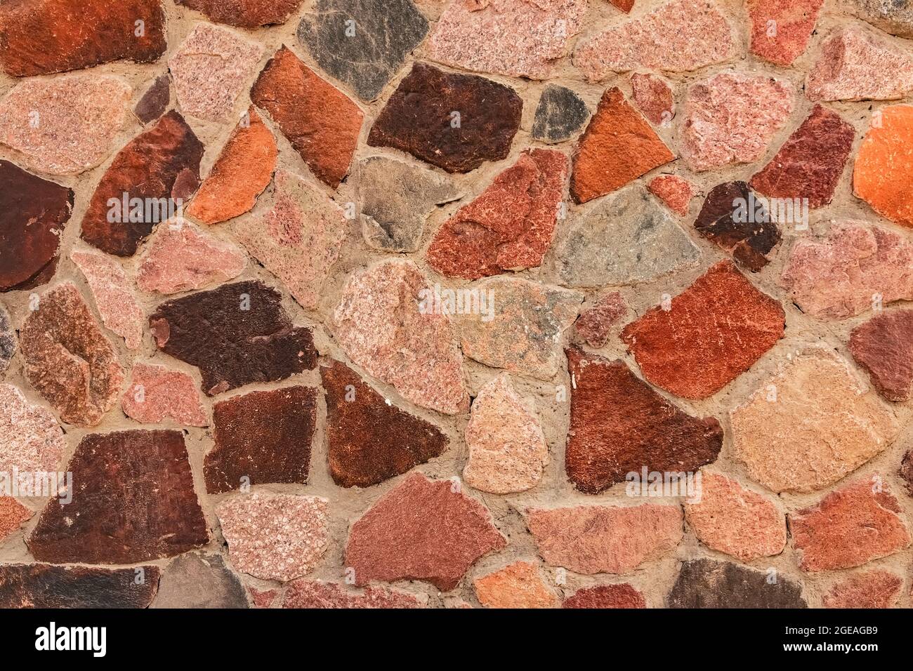 Decorative wall cladding with large granite stones. Mosaic background ...