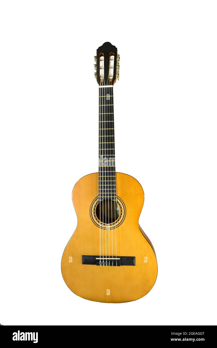 Brown acoustic six-string wooden guitar stands vertically on a white ...