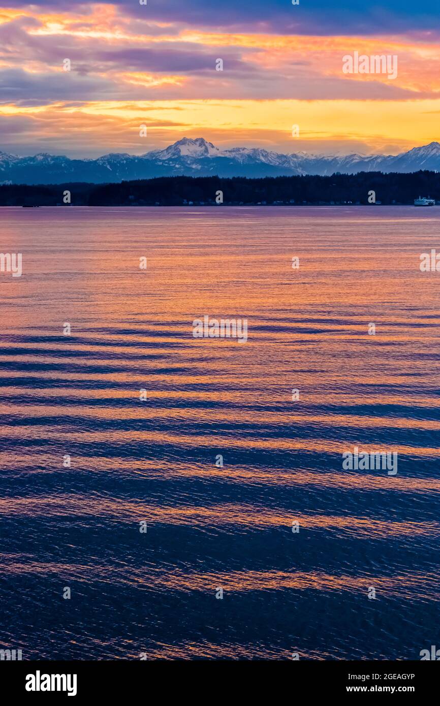 Winter sunset over Elliot Bay of Puget Sound with distant Bainbridge ...