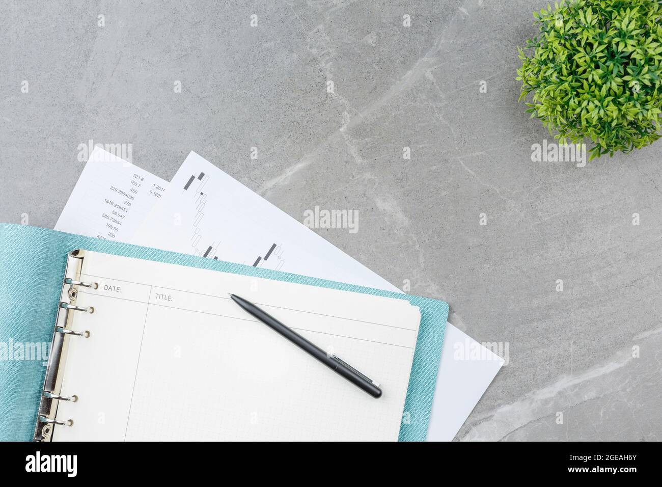 Open blue notebook office desk Stock Photo - Alamy