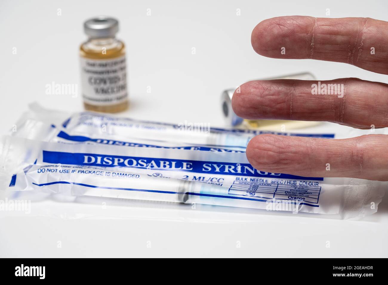 Syringes three syringes hi-res stock photography and images - Alamy