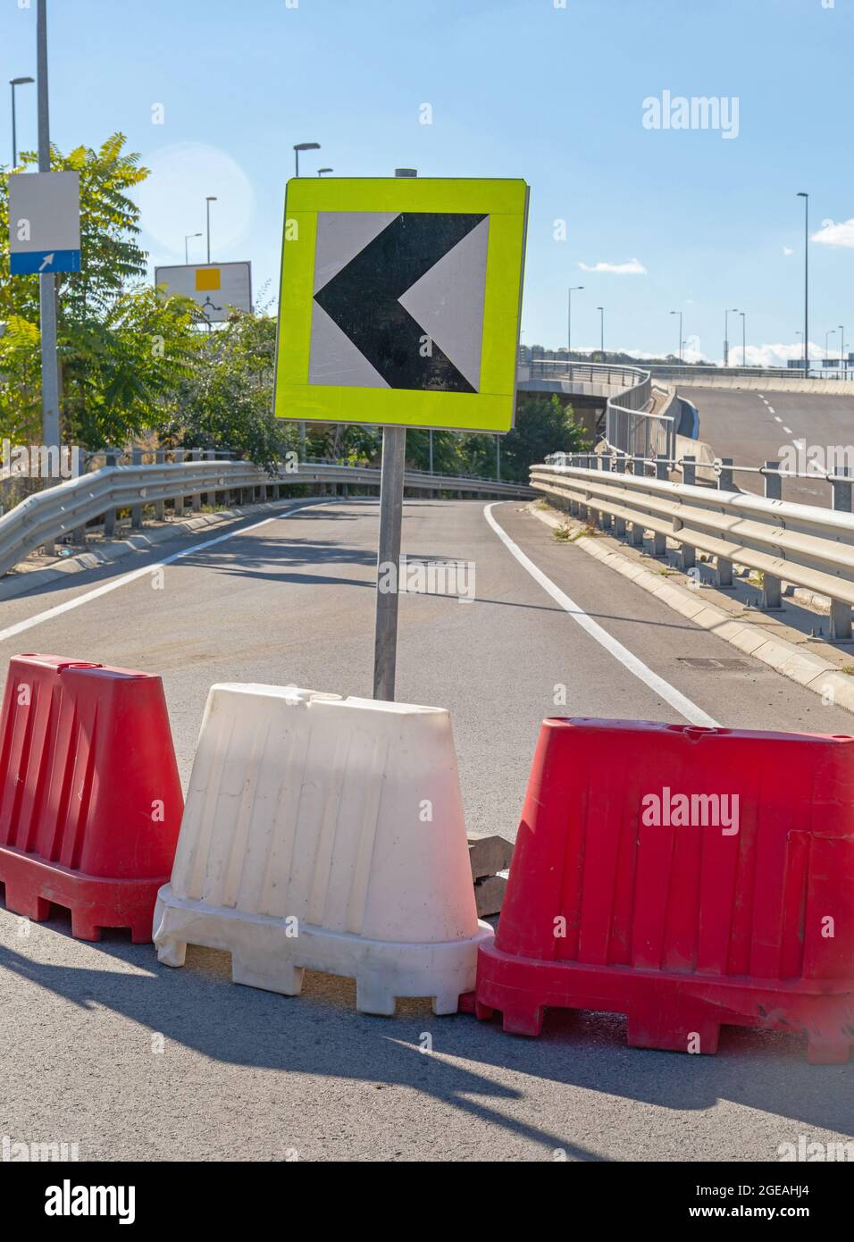 Arrow Sign and Barriers at Road Traffic Diversion Stock Photo - Alamy