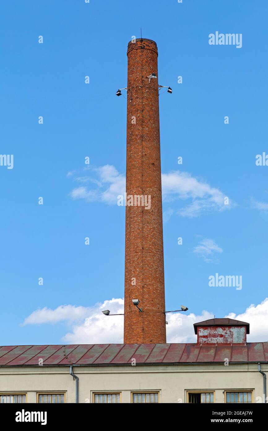Tall Brick Chimney Structure With Reflectors Day Stock Photo - Alamy