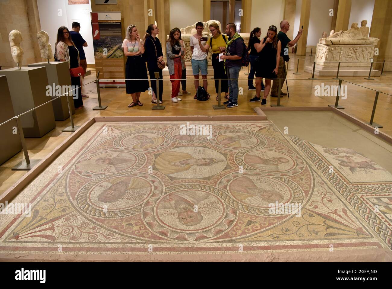 Visitors perusing a mosaic of the Seven Wise Men from a Roman villa in ... Visitors perusing a mosaic of the Seven Wise Men from a Roman villa in ...