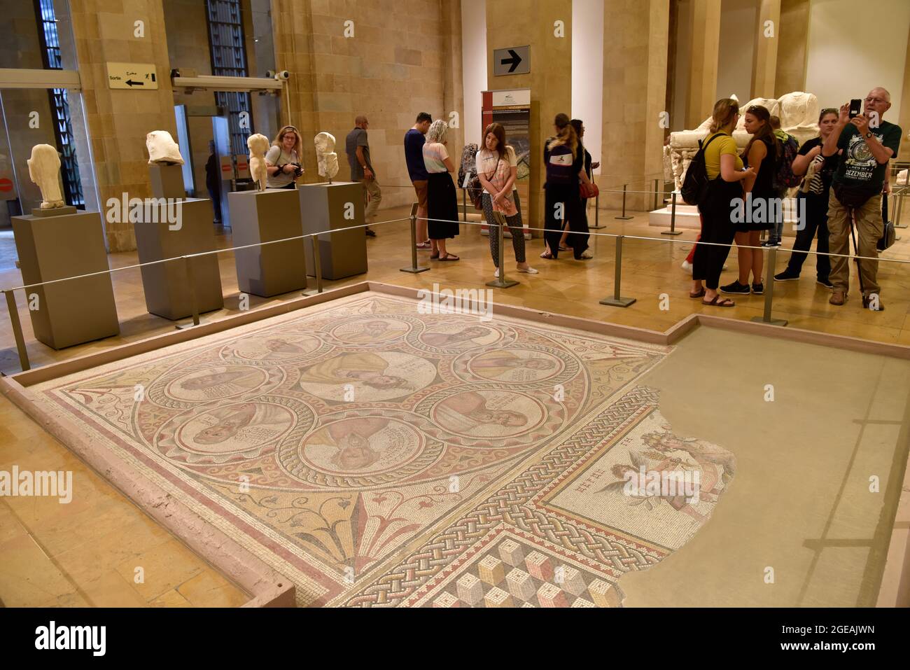 Visitors perusing a mosaic of the Seven Wise Men from a Roman villa in ... Visitors perusing a mosaic of the Seven Wise Men from a Roman villa in ...