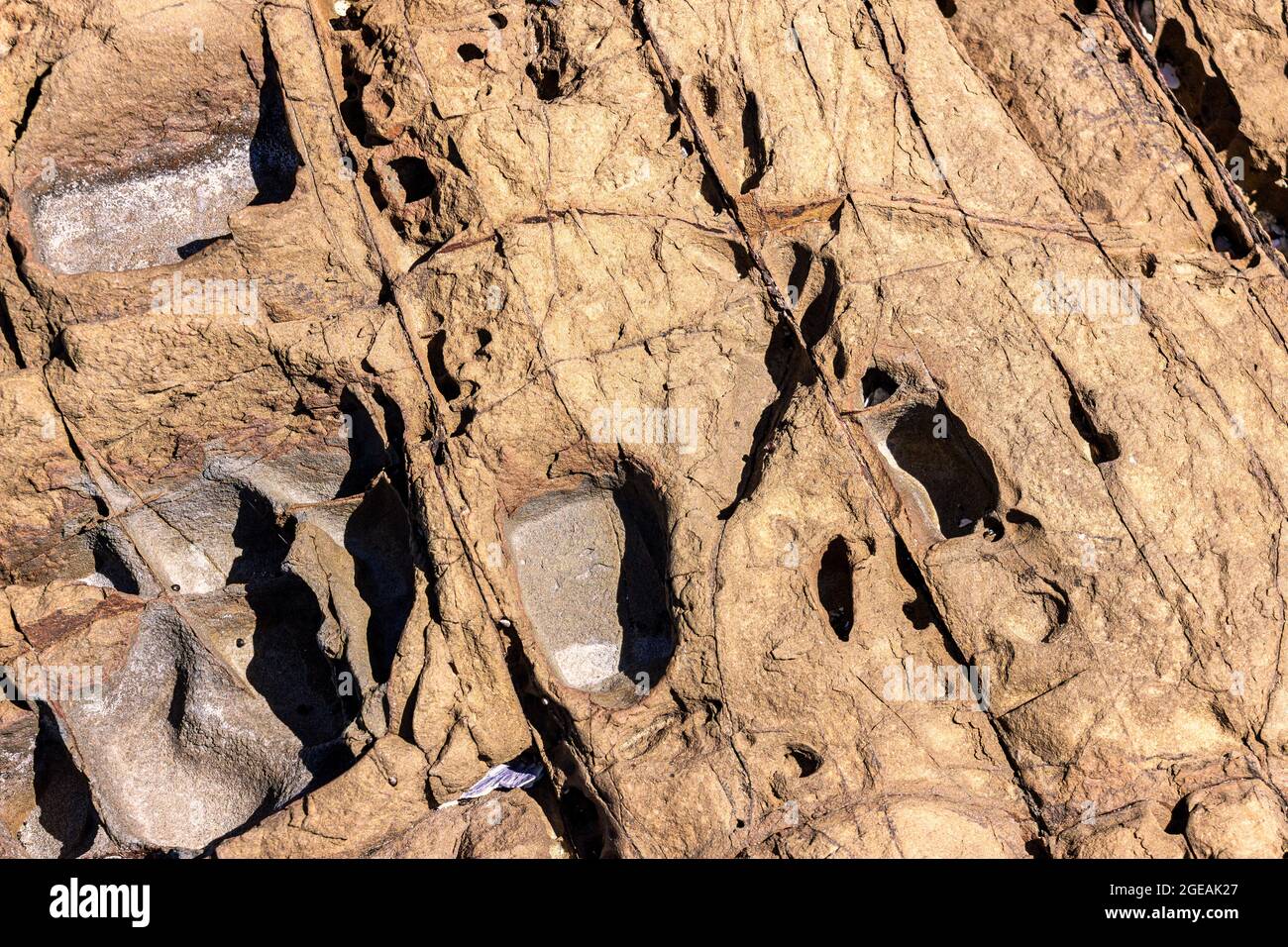Rocks that can be seen at low tide at Melkbosstrand Cape Town, with ...