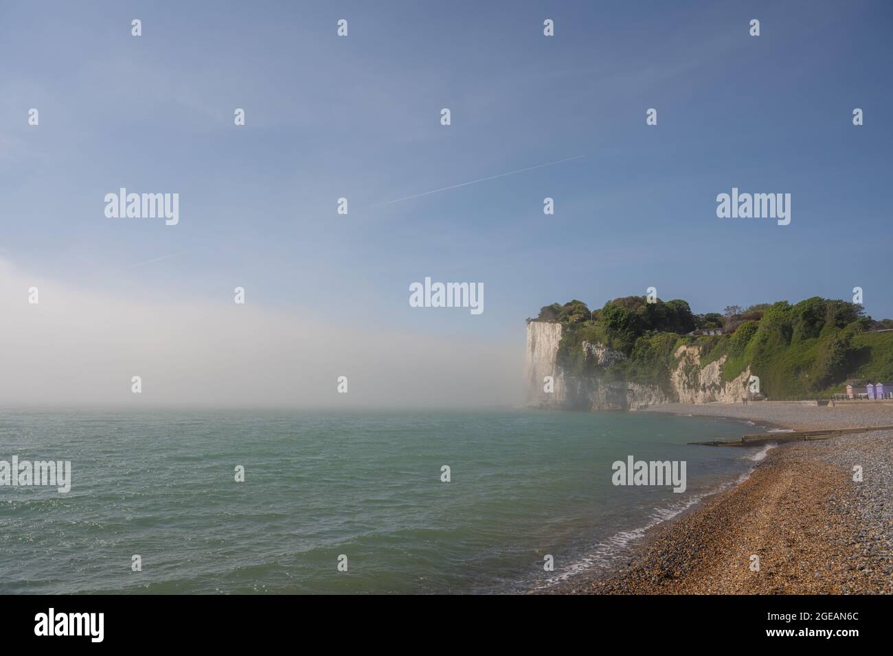 Fog rolling in from the English Channel around the cliffs at St ...