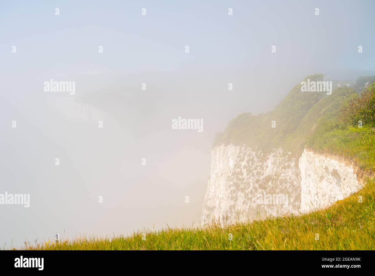Fog rolling in from the English Channel around the cliffs at St ...