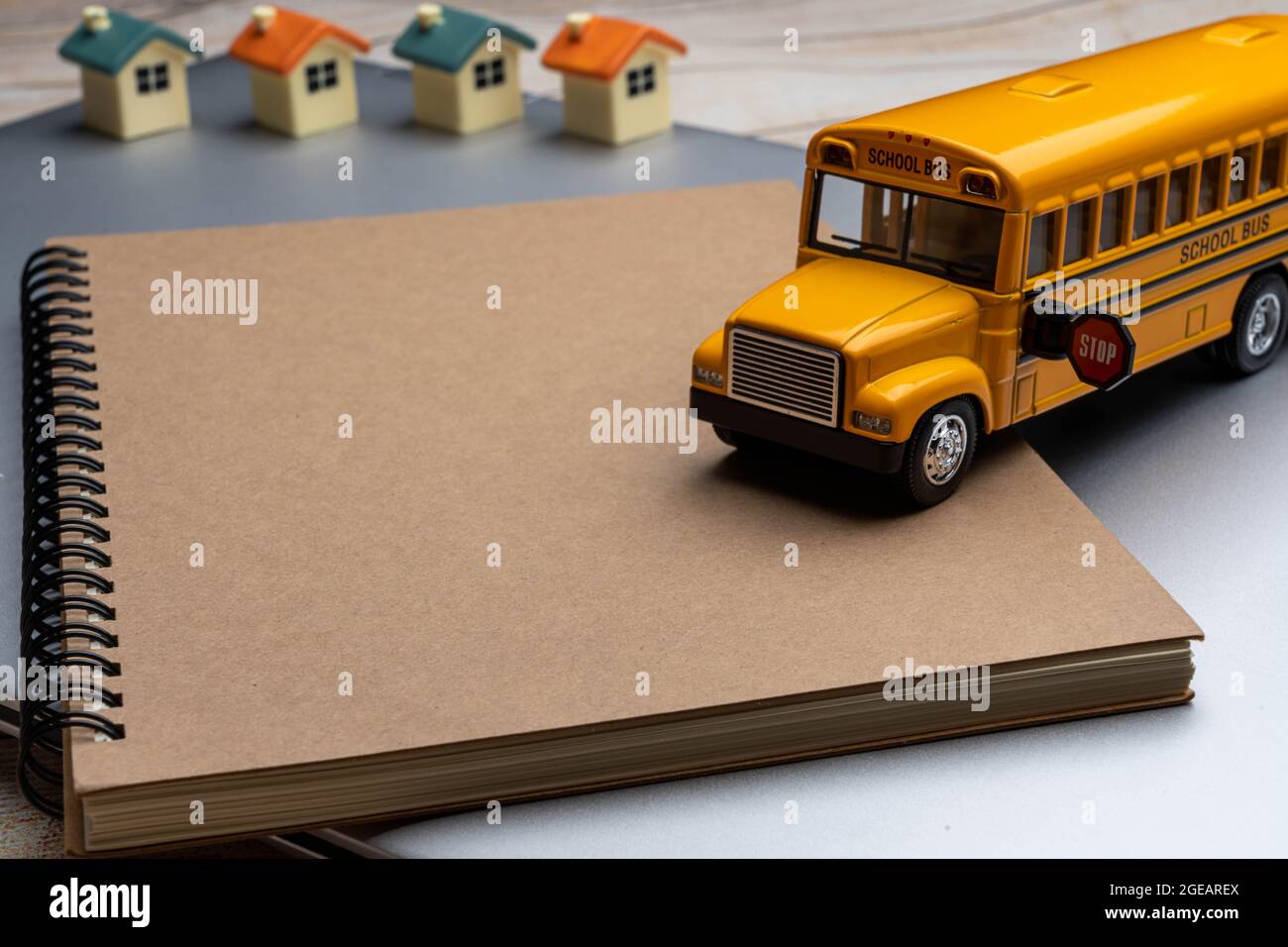School bus on the Book. Back to School Concept Stock Photo - Alamy