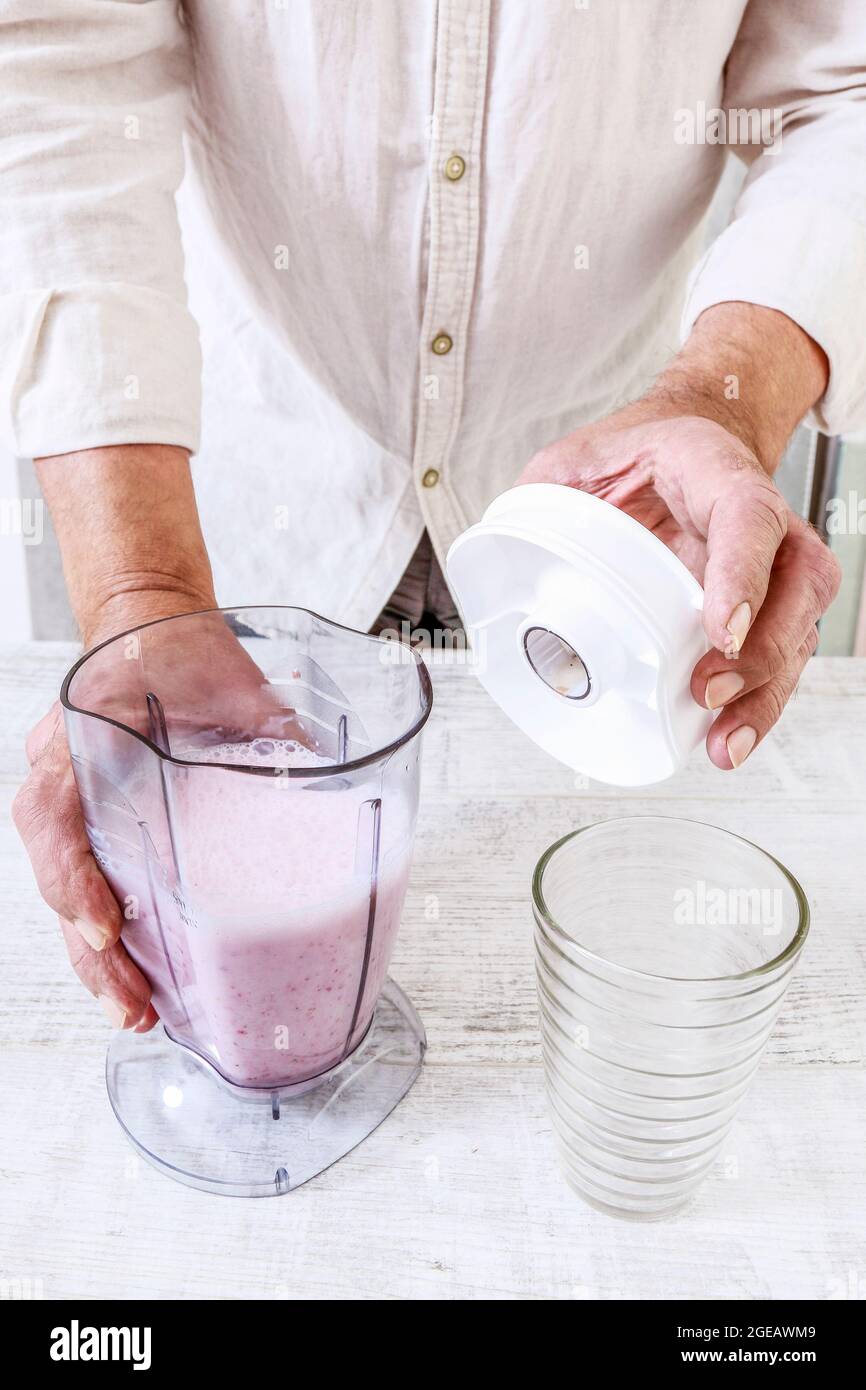 How to make fruit smoothie using blender. Step by step, tutorial Stock ...