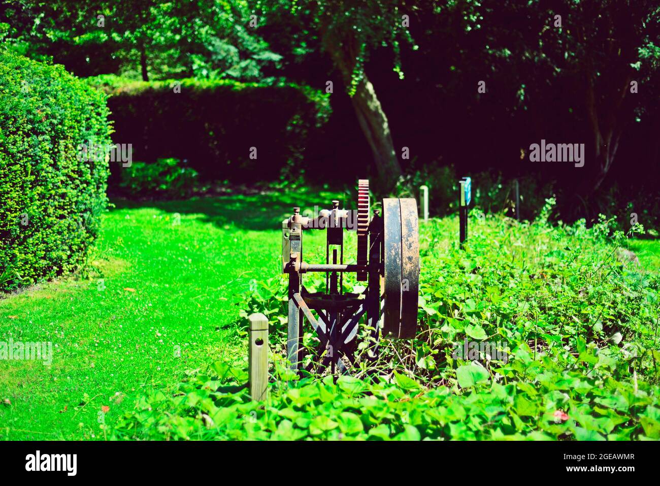 Side view of disused water pump Stock Photo - Alamy