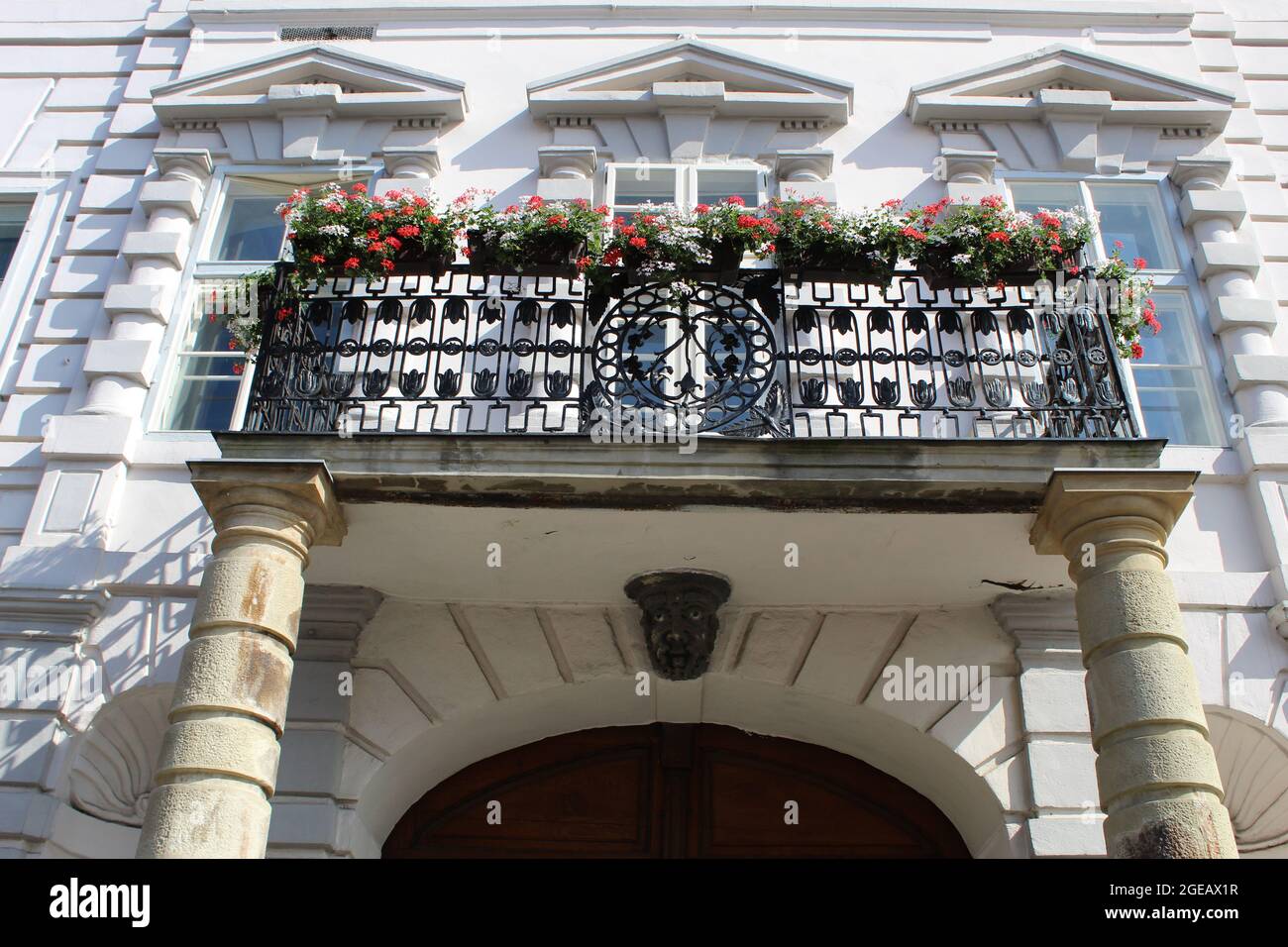 Balcony with red flowers hi-res stock photography and images - Alamy