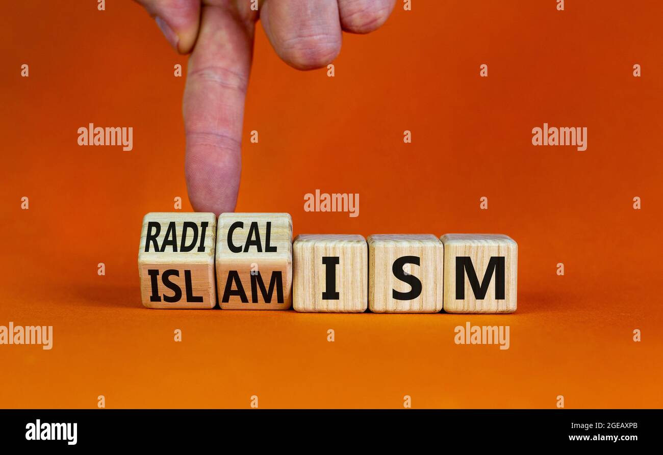 Radicalism or islamism symbol. Businessman turns cubes and changes the ...