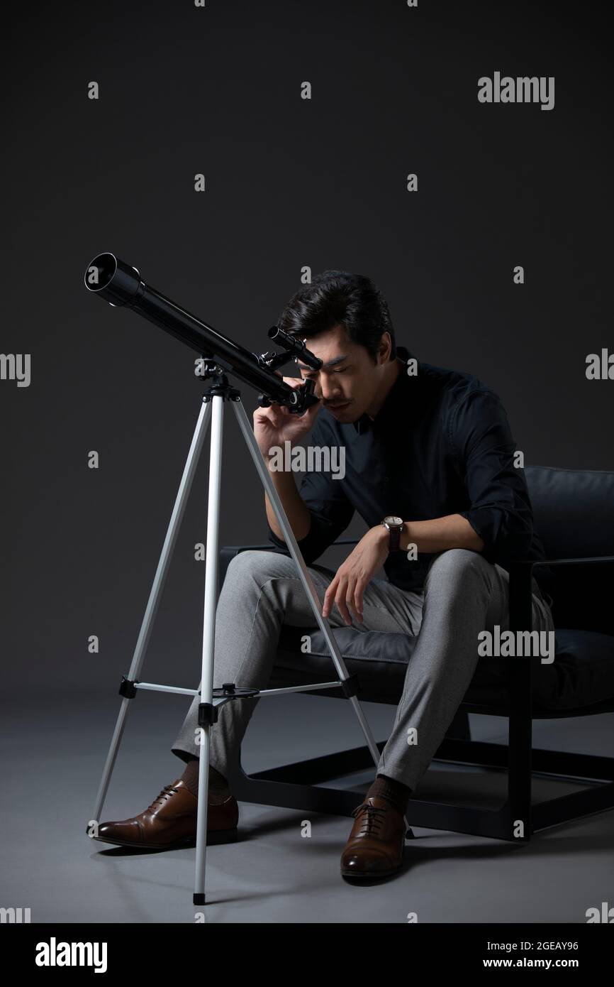 Person using telescope space hi-res stock photography and images - Alamy